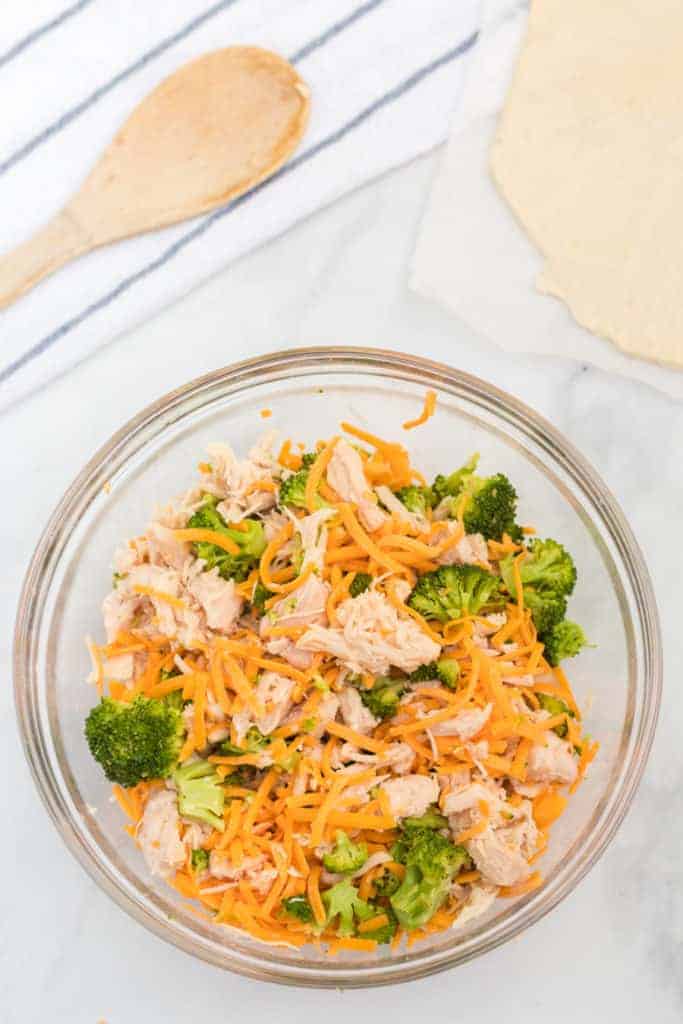 Cheesy Chicken and Broccoli Calzones — Bless this Mess