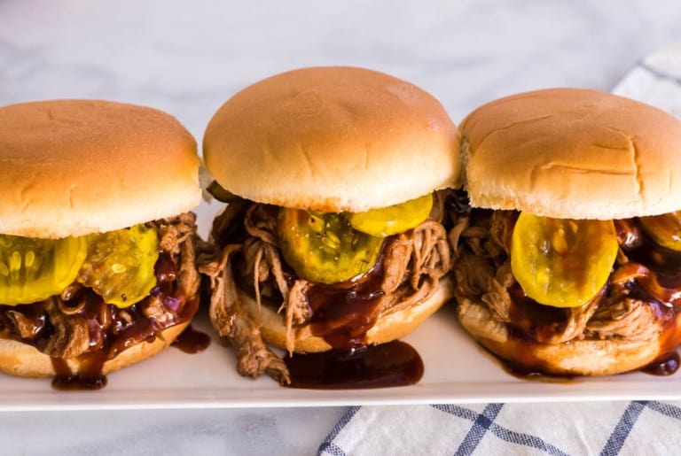 Slow Cooker Pulled Pork Sandwiches — Bless this Mess