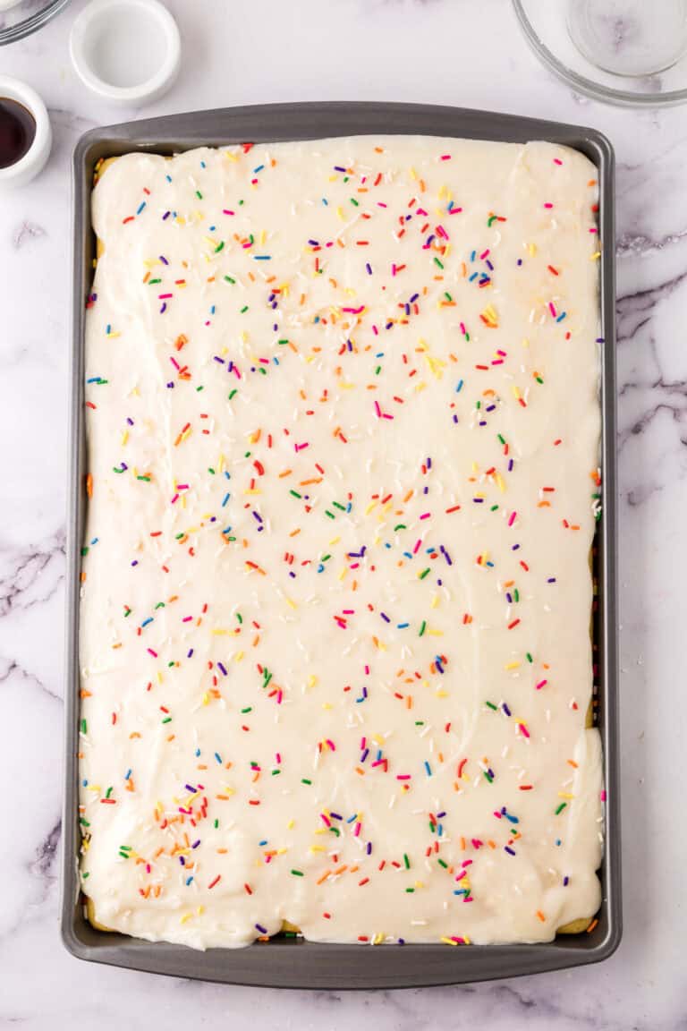 Quick Easy Vanilla Sheet Cake | Cake-Mix Recipe with Icing and Sprinkles